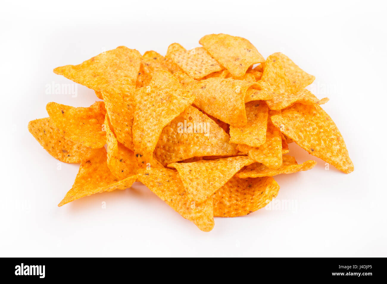 front view of nachos chips on top of each other isolated on white ...