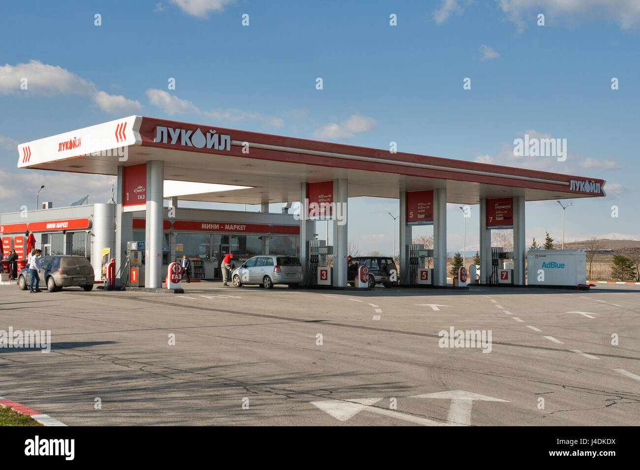 PLOVDIV, BULGARIA - FEBRUARY 11, 2015: Lukoil gas station on highway ...
