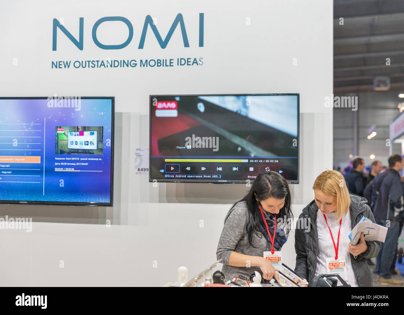KIEV, UKRAINE - APRIL 07, 2017: Visitors visit Nomi mobile devices ...