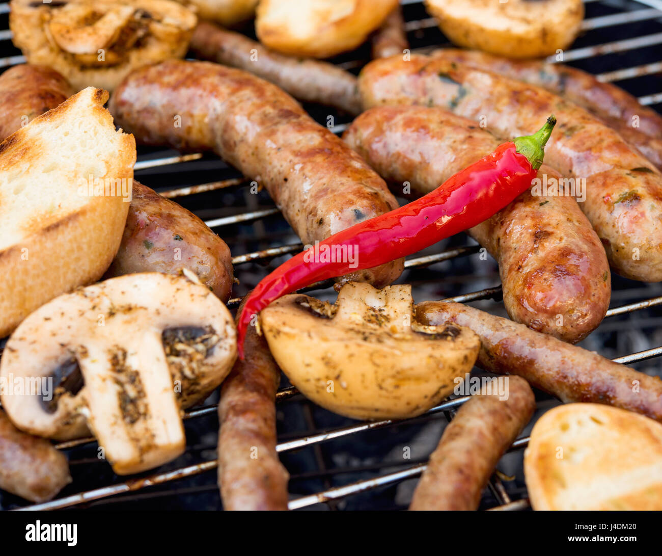 Sausages mushrooms peppers hi-res stock photography and images - Alamy