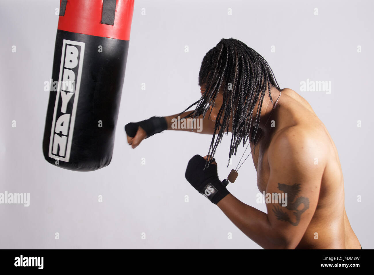 Strong fit black man boxing in a studio with white background Stock ...