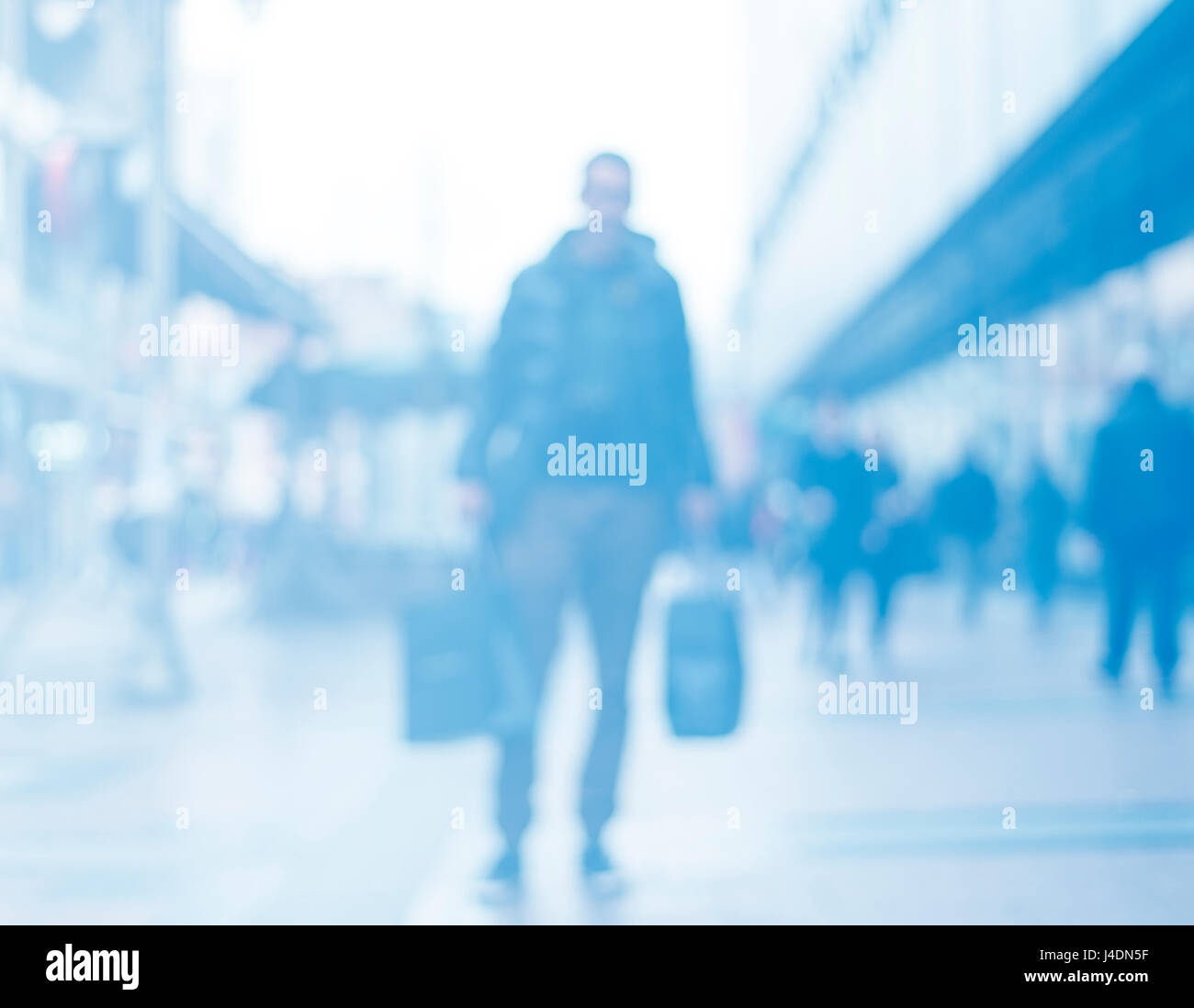 abstract blurred background of people on the street, unrecognizable ...
