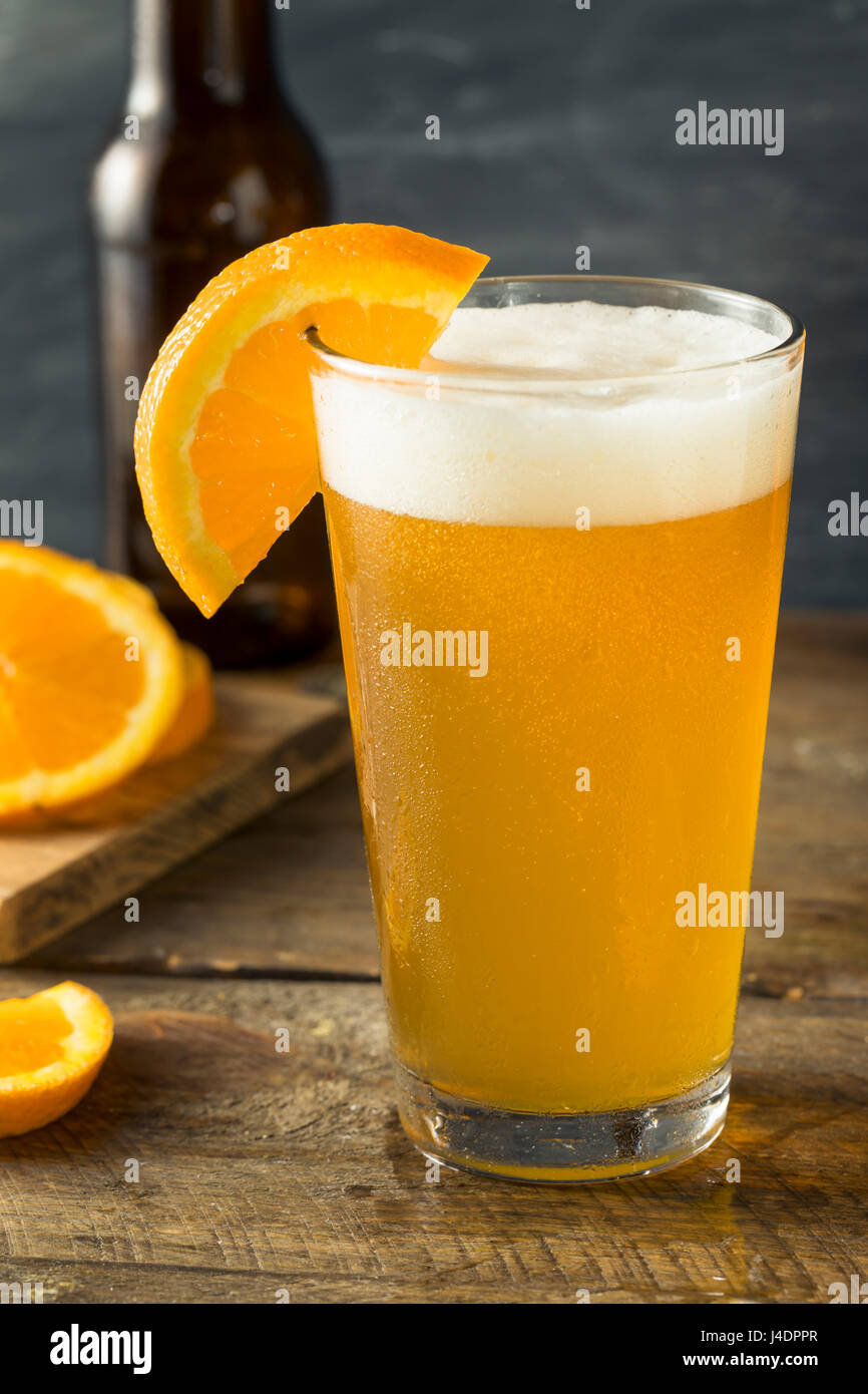 Organic Orange Citrus Craft Beer with a Garnish Stock Photo - Alamy