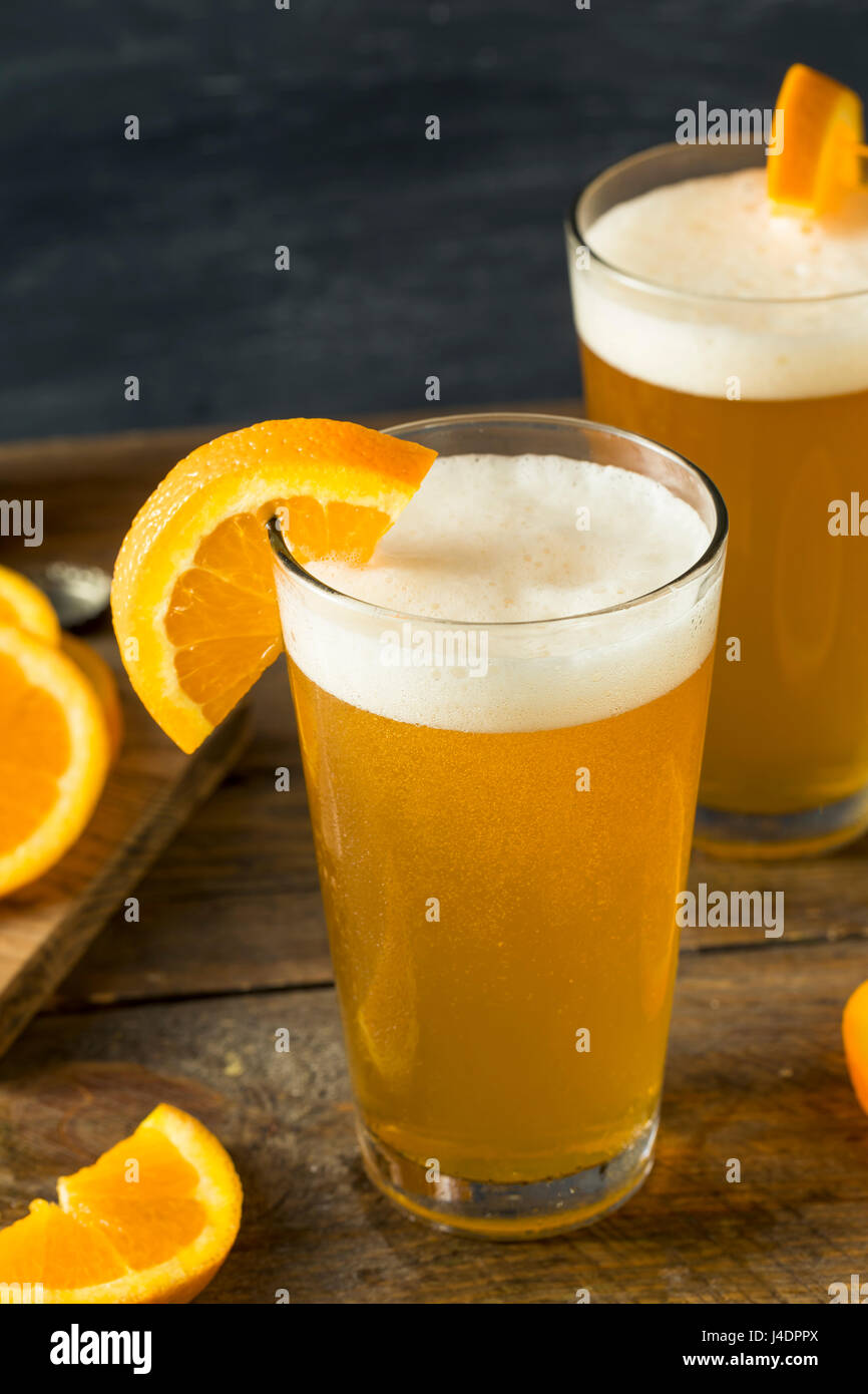 Organic Orange Citrus Craft Beer with a Garnish Stock Photo - Alamy