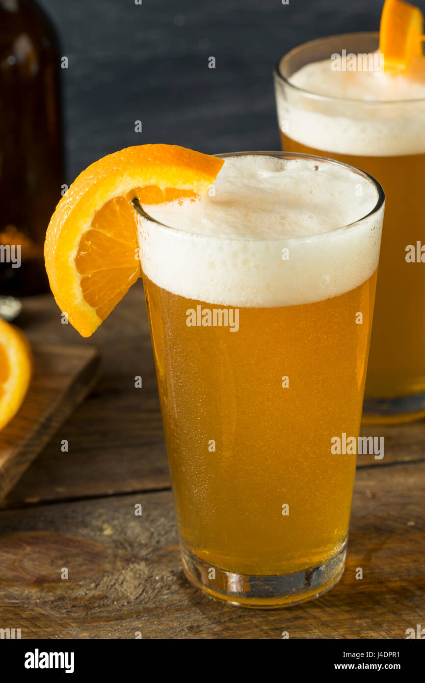 Organic Orange Citrus Craft Beer with a Garnish Stock Photo - Alamy