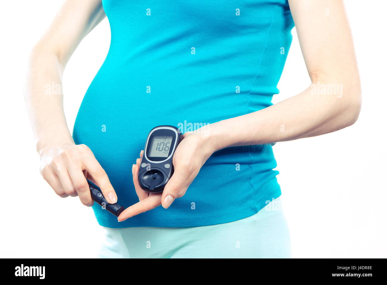 Pregnant woman holding glucose meter and checking sugar level, concept ...
