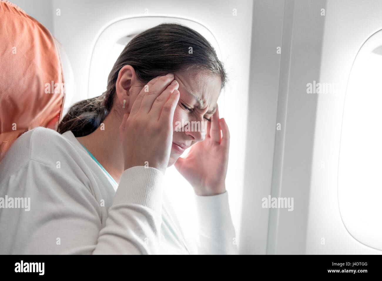 Woman scared plane hi-res stock photography and images - Alamy