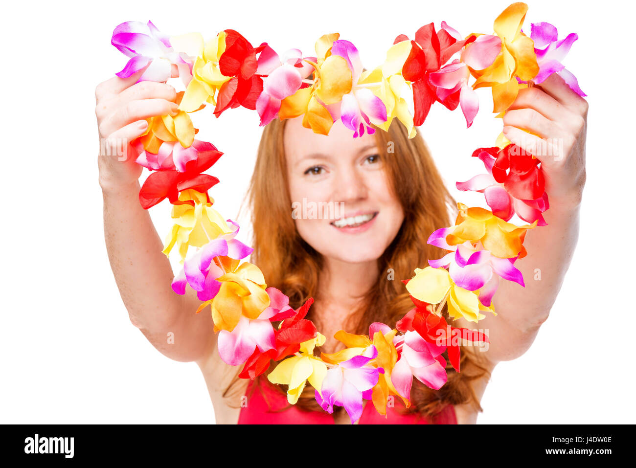 Floral lei in focus in hands of happy girl close-up Stock Photo - Alamy