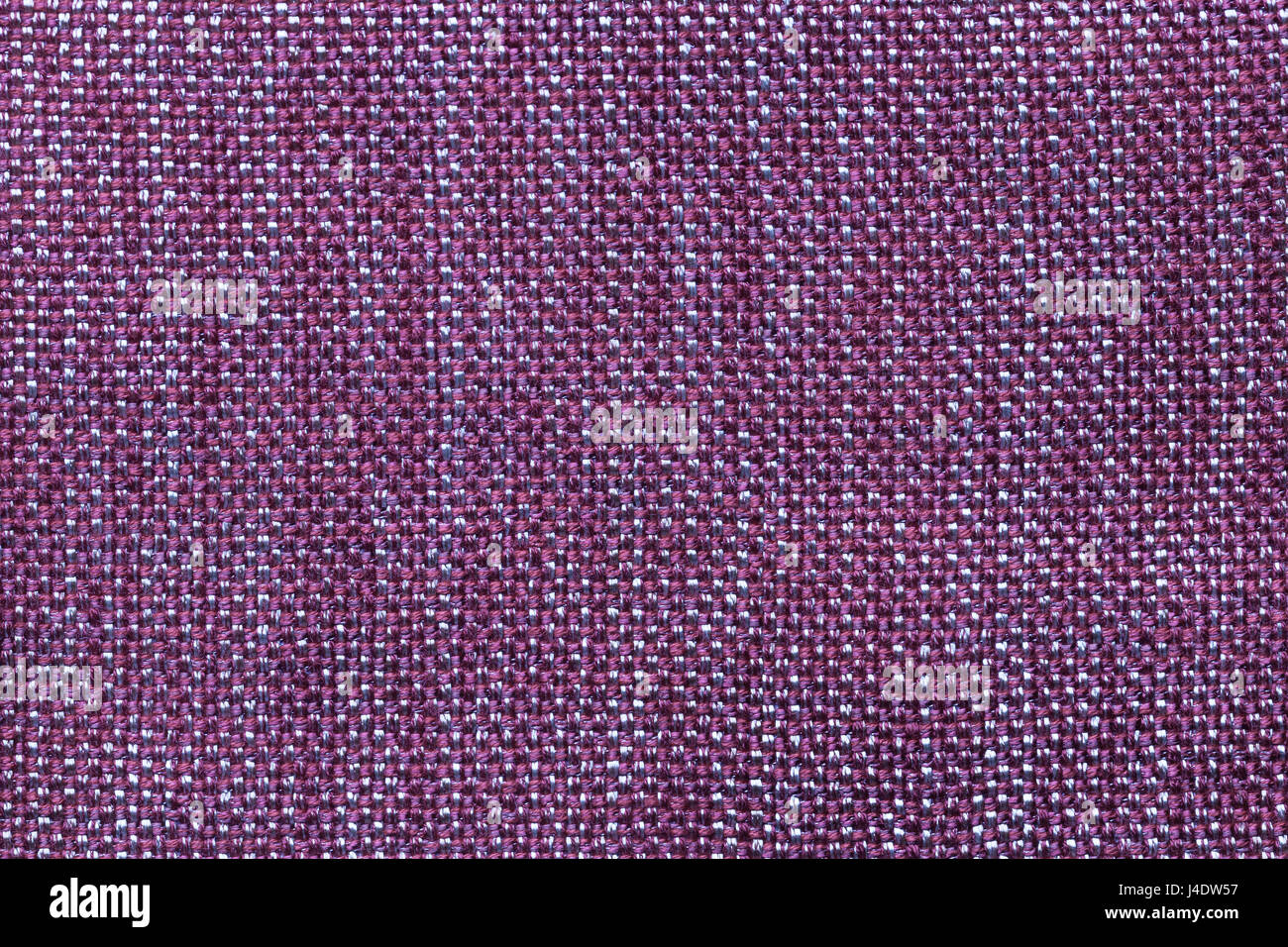 Dark violet background with checkered pattern, closeup. Structure of ...