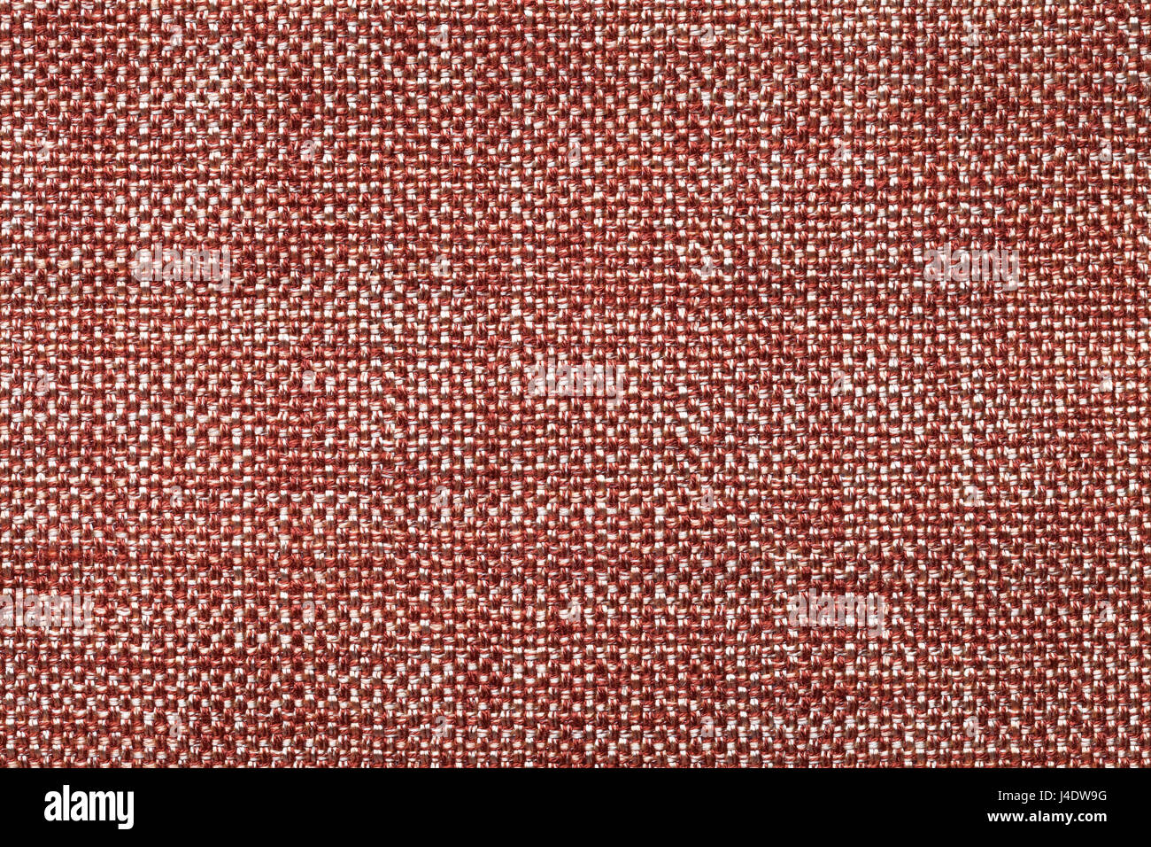 Dark red background with checkered pattern, closeup. Structure of the ...