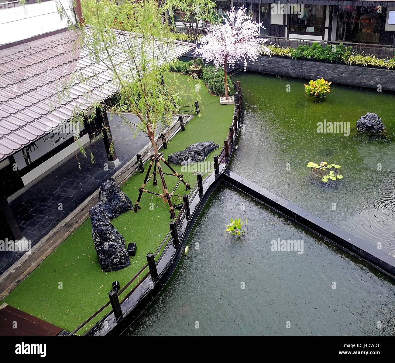 Japanese garden in rain. Raining in Japanese style garden Stock Photo ...