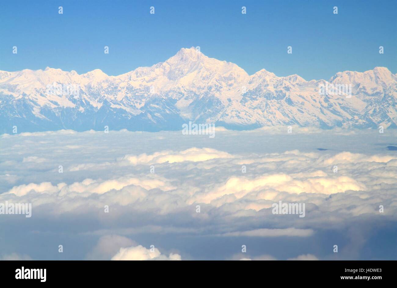 Aerial view from an airplane over the Himalayas and Everest mountain on ...