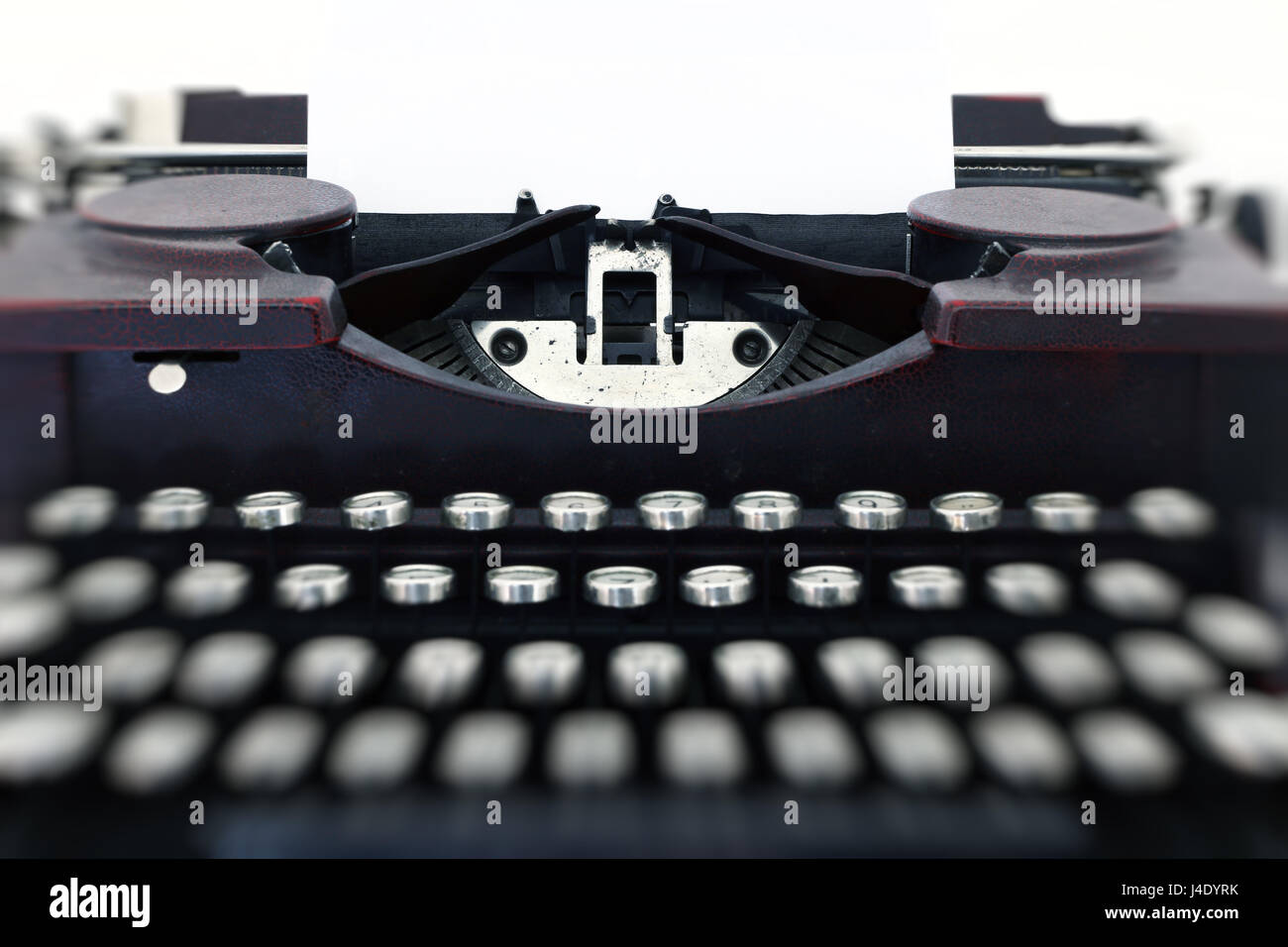 Blank paper in typewriter machine Stock Photo - Alamy