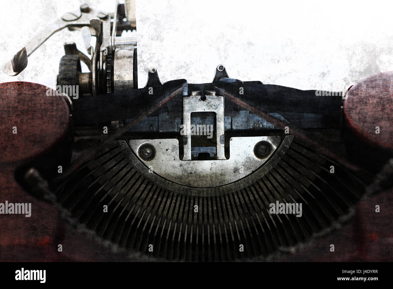 Blank paper in the old typewriter machine in grunge style - copy space ...