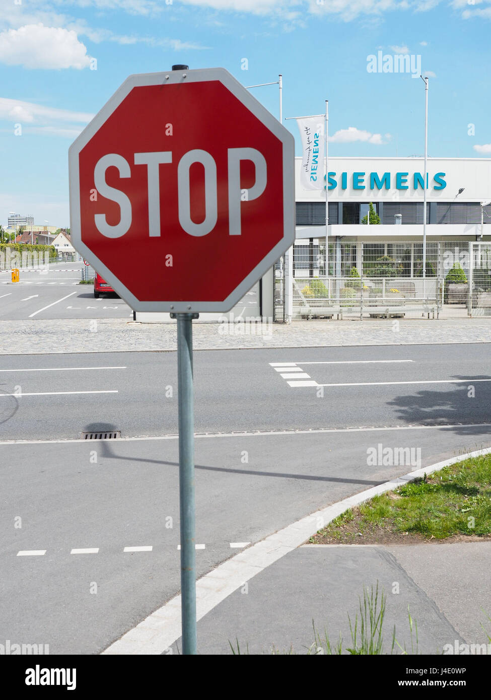 A stop sign can be seen in front of a plant of the electronics company ...