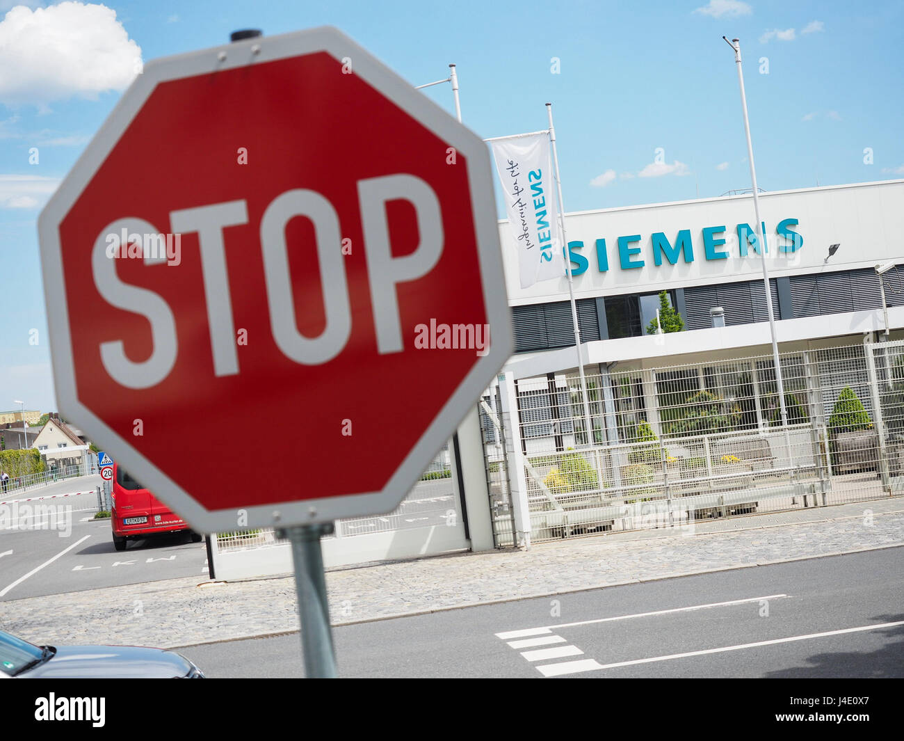 A stop sign can be seen in front of a plant of the electronics company ...