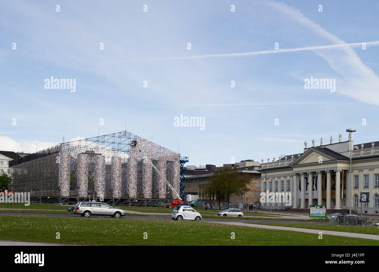 Kassel, Germany. 09th May, 2017. Cars pass the documenta artwork 'The ...