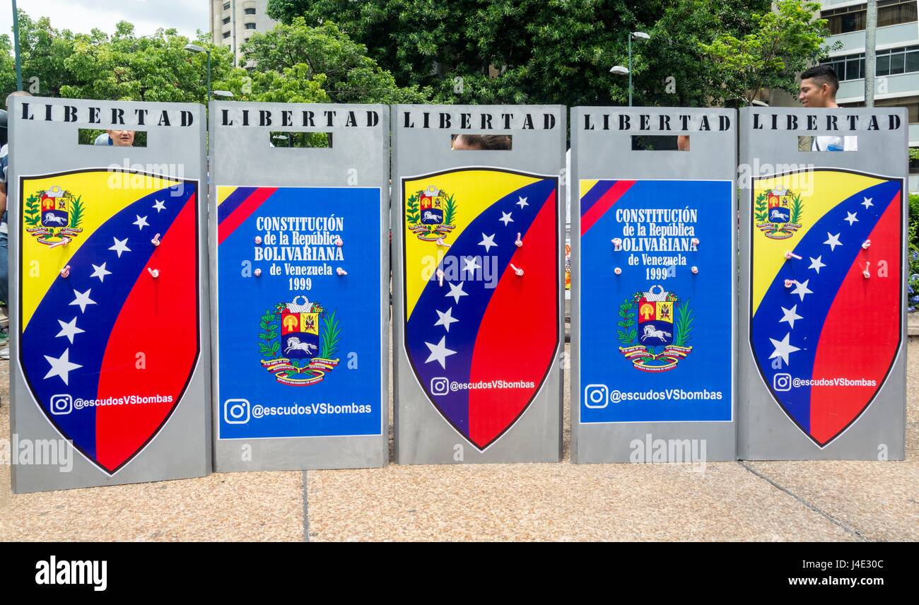 Metal shields, with labels of the 1999 Constitution of Venezuela. Under ...