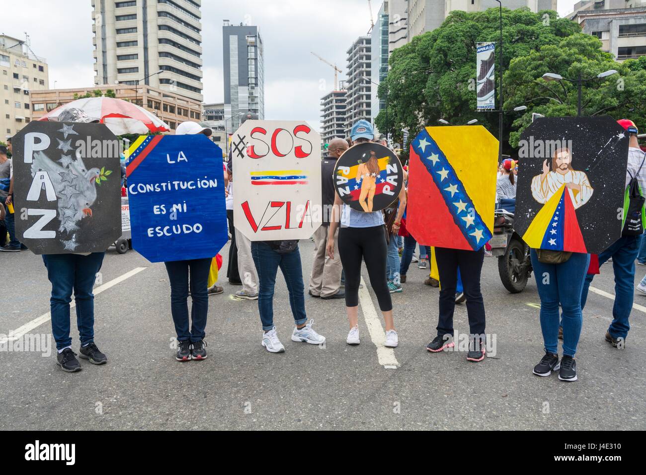 Women with different homemade shields in protest. Under the motto "Our ...
