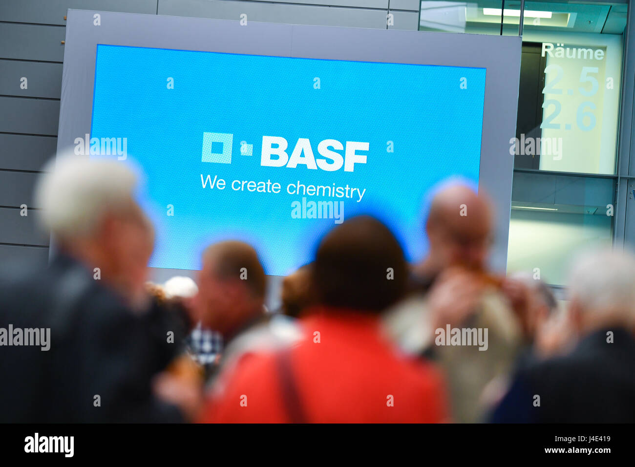 Mannheim, Germany. 12th May, 2017. Shareholders look at a video wall ...