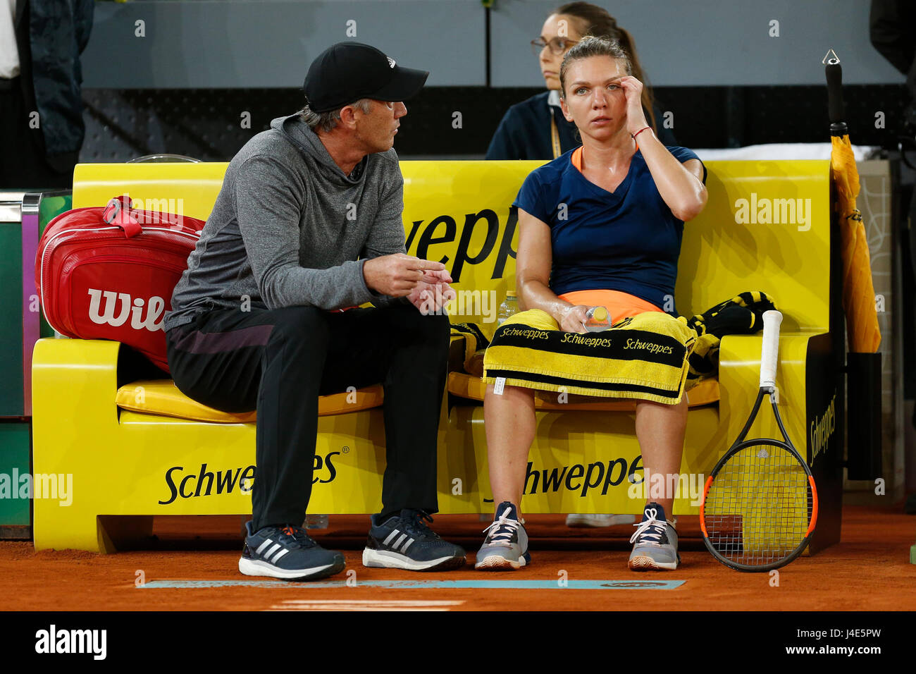 Madrid, Spain. 12th May, 2017. Simon Halep of Romania speaks with his ...