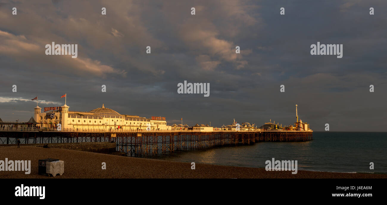 Brighton, UK. 12th May, 2017. A low sun at dusk leaves Brighton's ...