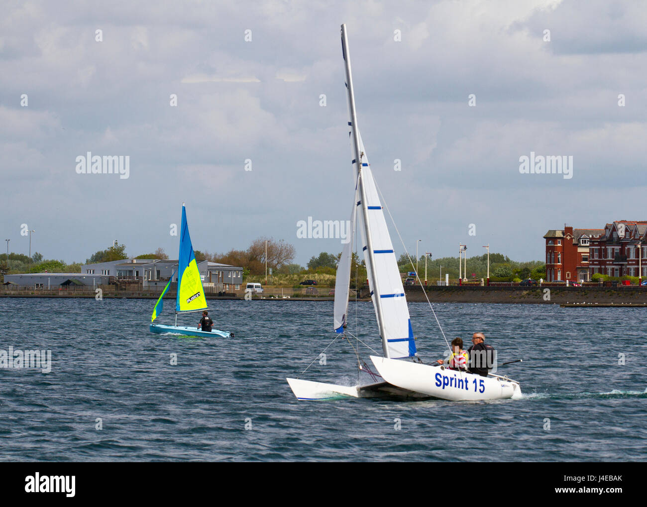 Small catamaran sailing boat on High Resolution Stock Photography and ...
