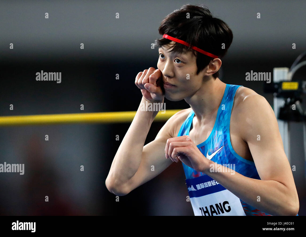 Shanghai, China. 13th May, 2017. Zhang Guowei of China reacts during ...