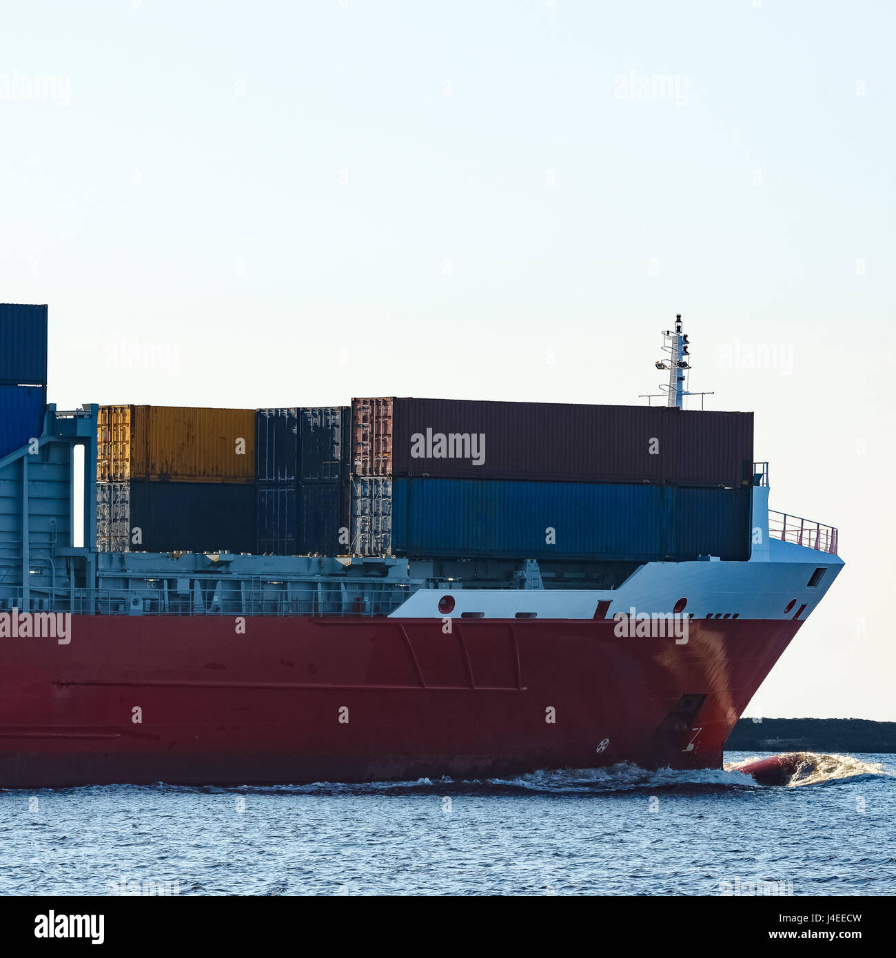Red container ship sailing to the Baltic sea Stock Photo - Alamy