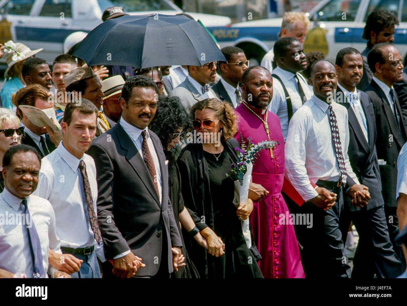 Funeral procession for homeless activist Mitch Synder is lead by L to R ...