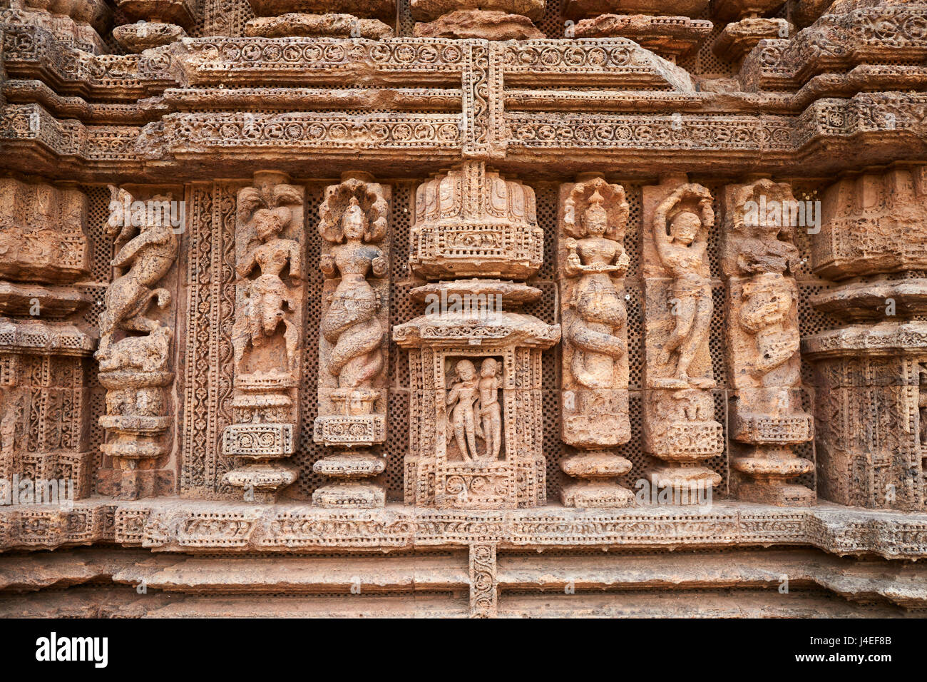 Ancient sandstone carvings on the walls of the ancient sun temple at ...