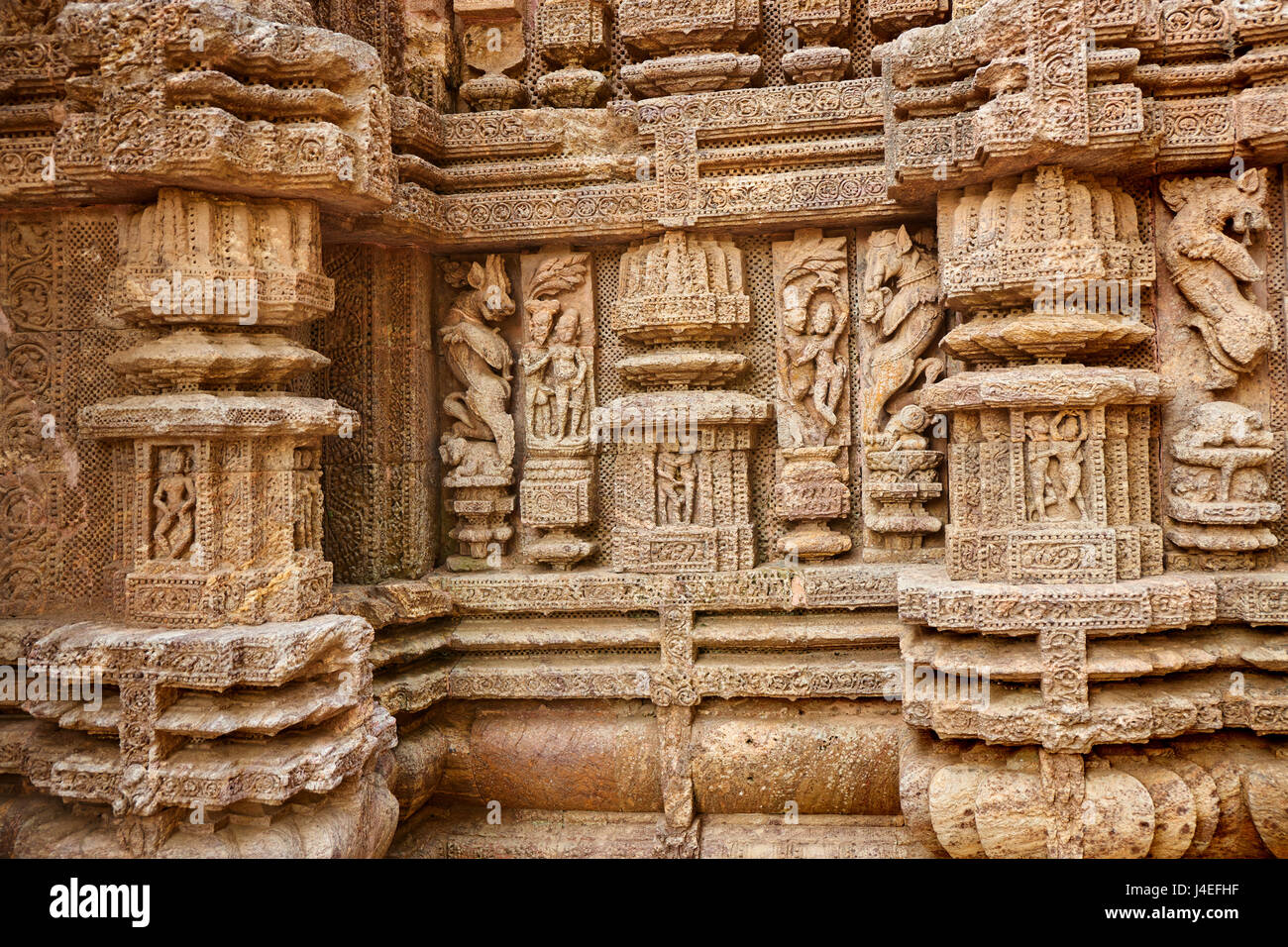 Ancient sandstone carvings on the walls of the ancient sun temple at ...