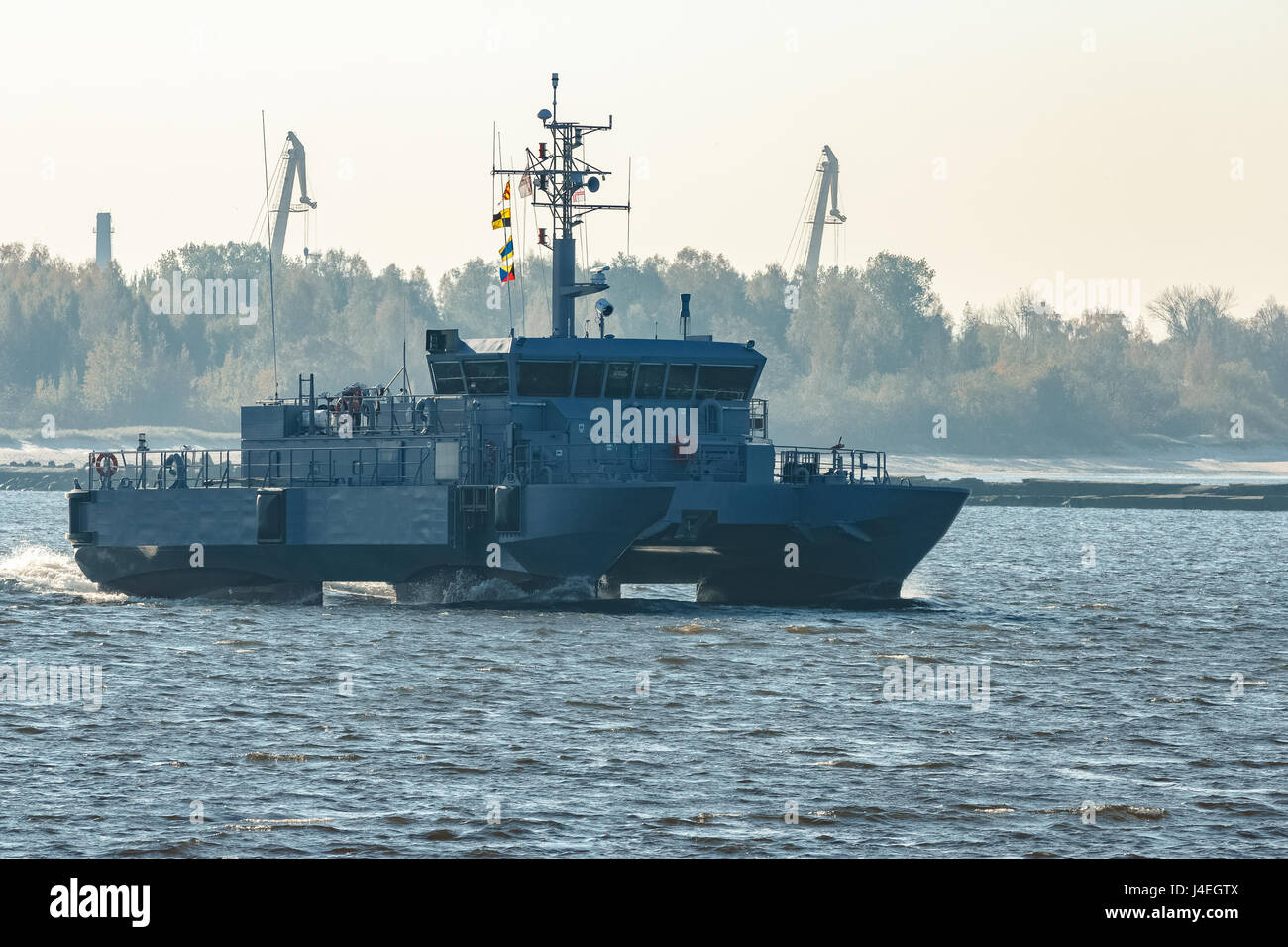 Small grey military ship moving from Baltic sea Stock Photo - Alamy