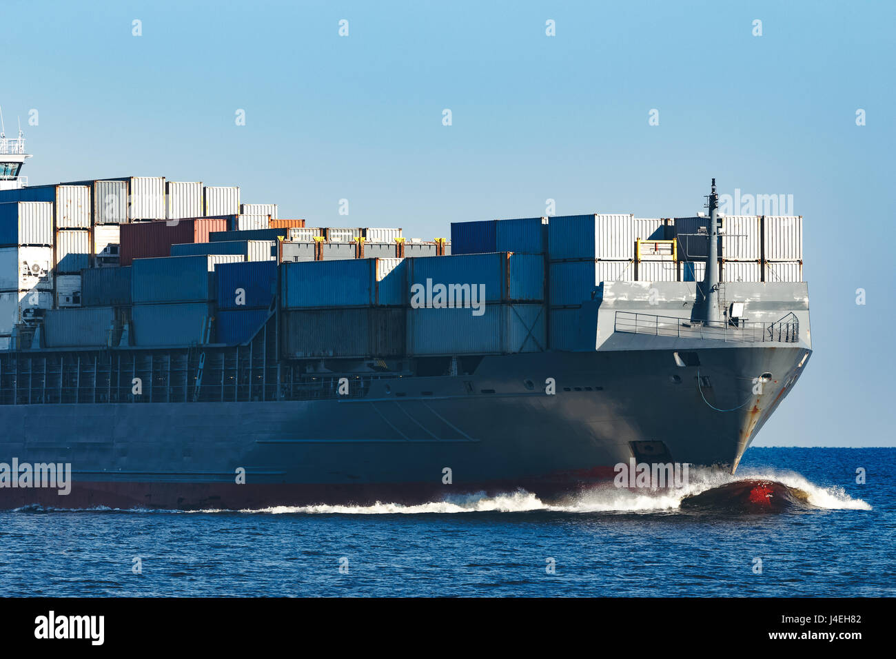 Large grey container ship moving from Baltic sea Stock Photo - Alamy