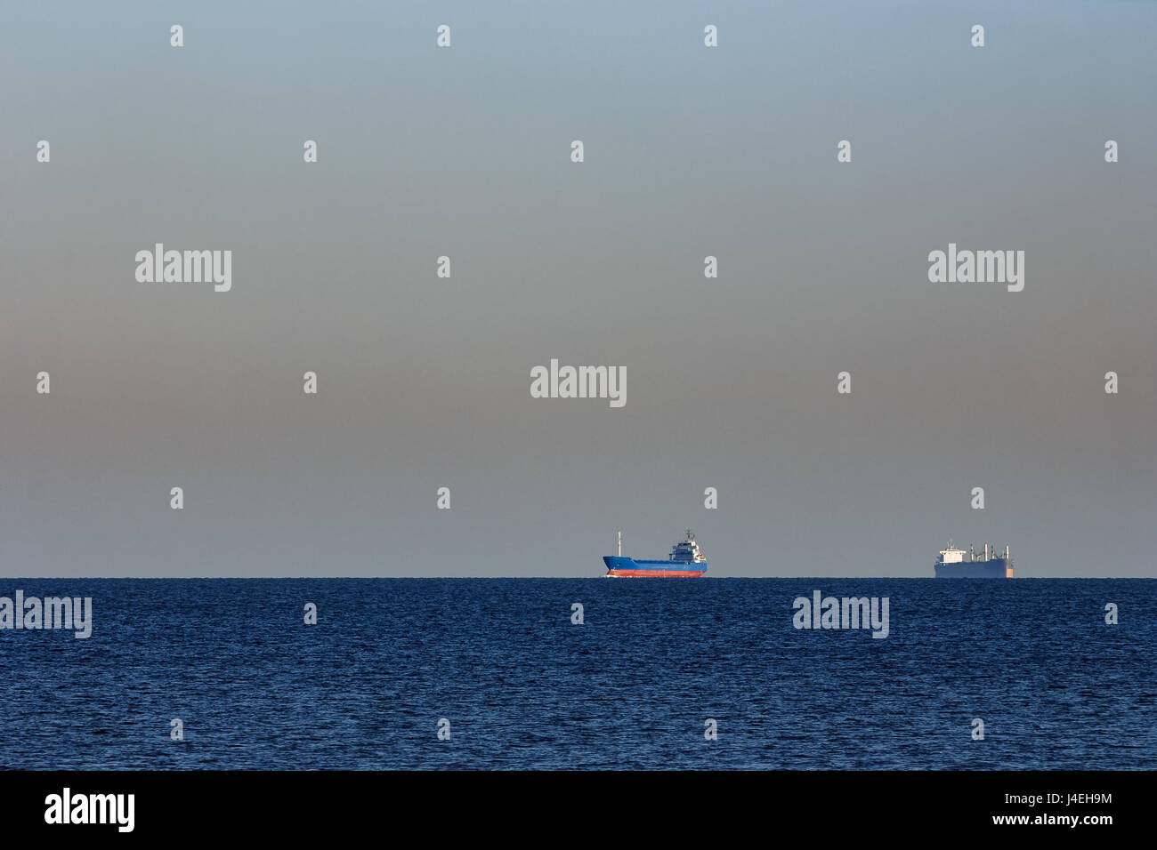 Blue cargo ship sailing from the Baltic sea Stock Photo - Alamy