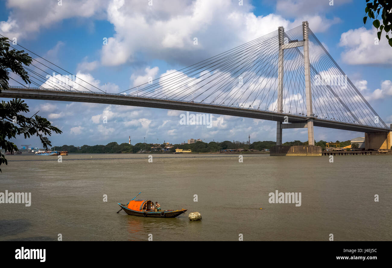 Wooden boats on river Hooghly with Vidyasagar Setu bridge at the ...