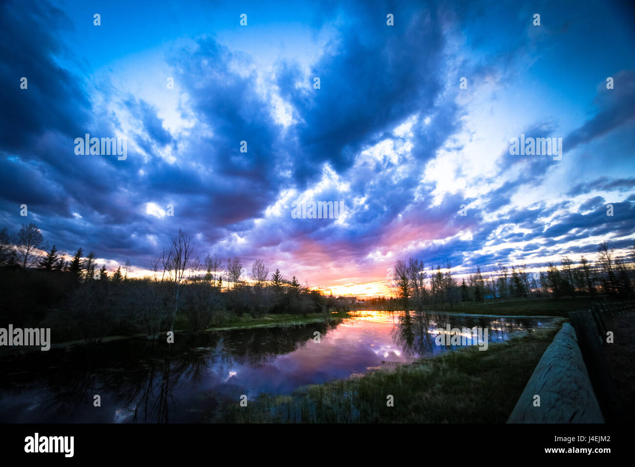 The most beautiful sunset ripples across a small town landscape Stock ...