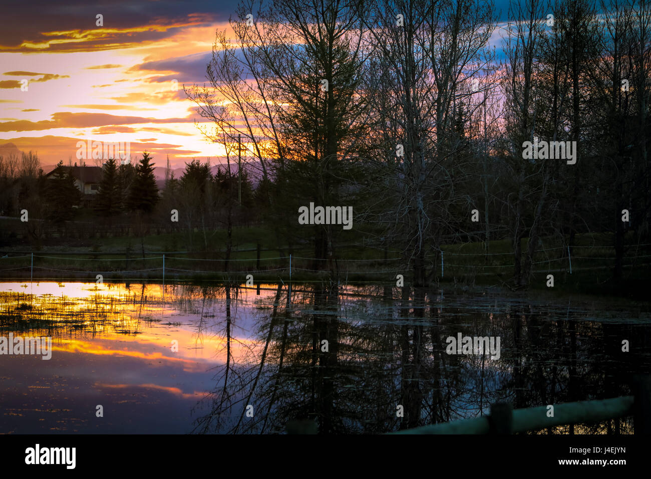 The most beautiful sunset ripples across a small town landscape Stock ...