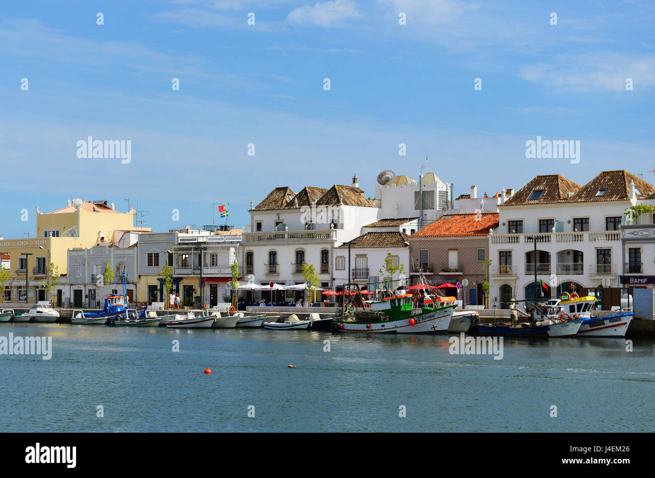 Beautiful old buildings along the Estero de la Rivera in Ayamonte ...