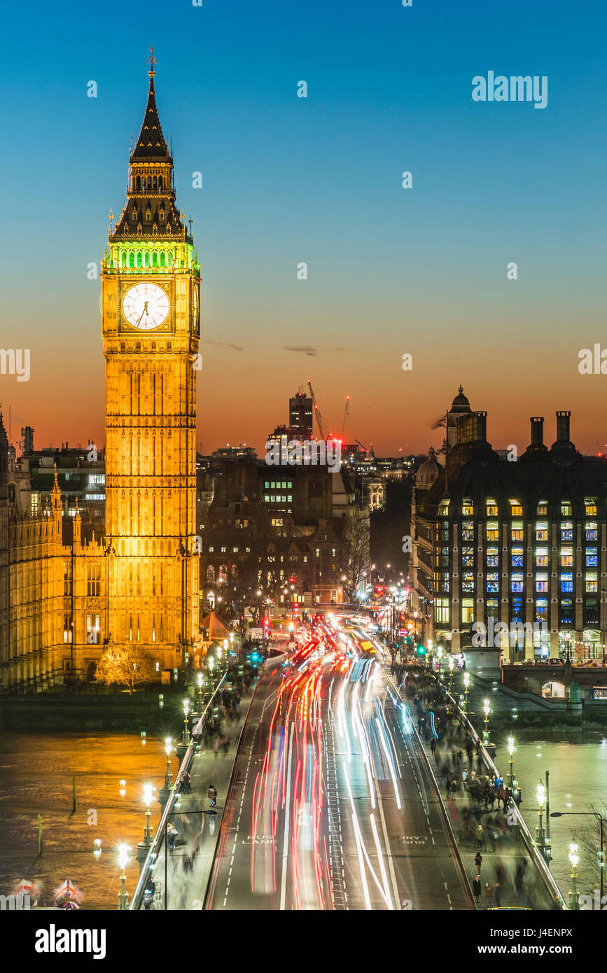 Big Ben (the Elizabeth Tower) and busy traffic on Westminster Bridge at ...