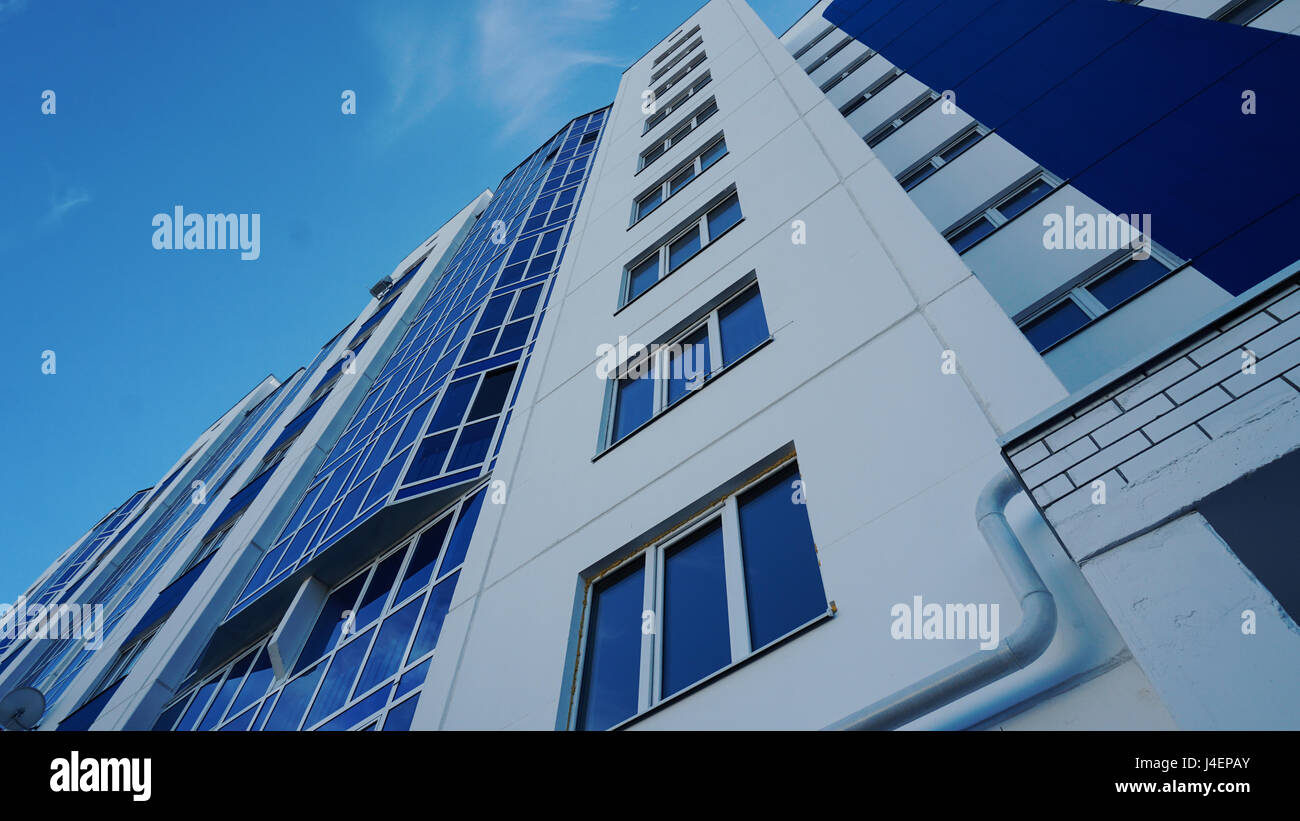 blue and white high-rise building,view from below Stock Photo - Alamy