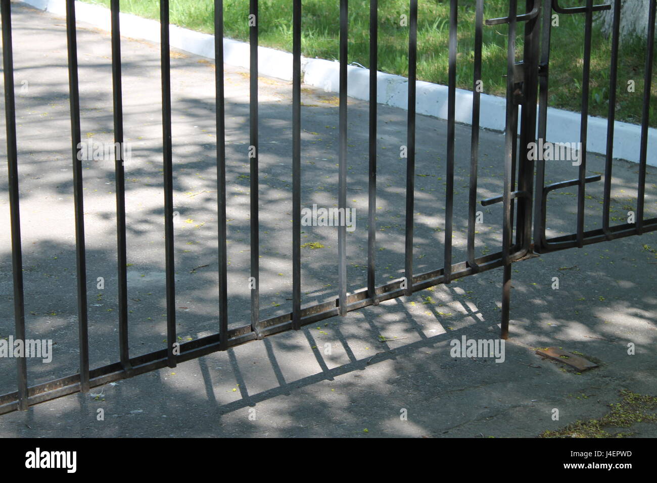metal gate side view, open 4k beautiful Stock Photo - Alamy