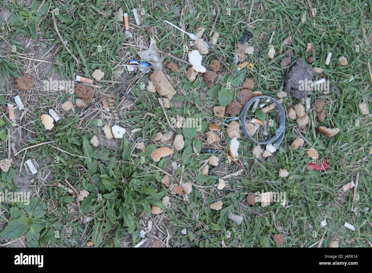 Endless waste trash garbage dumping ground grass Stock Photo - Alamy