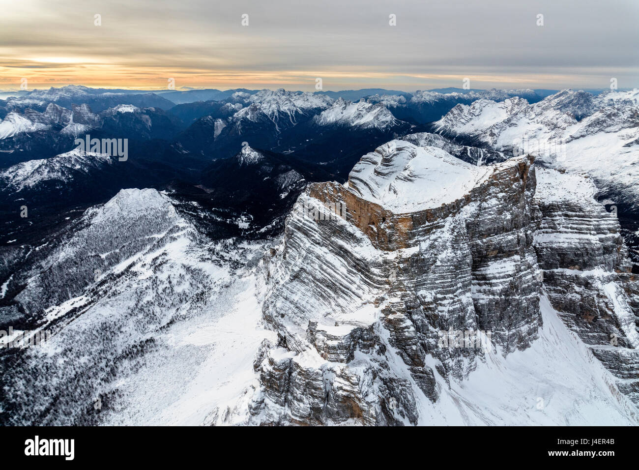 Aerial view of the rocky peaks of Monte Pelmo at dawn, Zoldo, Dolomites ...