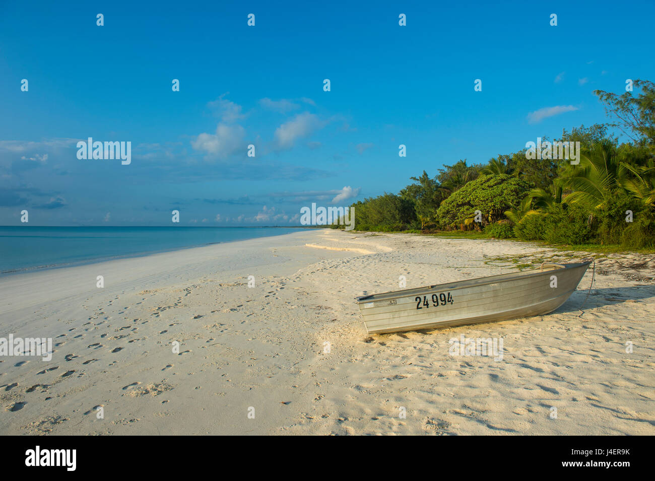 White sand beach at sunset, Ouvea, Loyalty Islands, New Caledonia ...