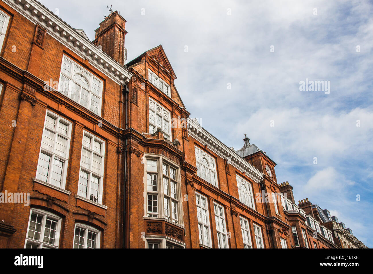 Old English brick houses in London, United Kingdom. Diagonal line ...