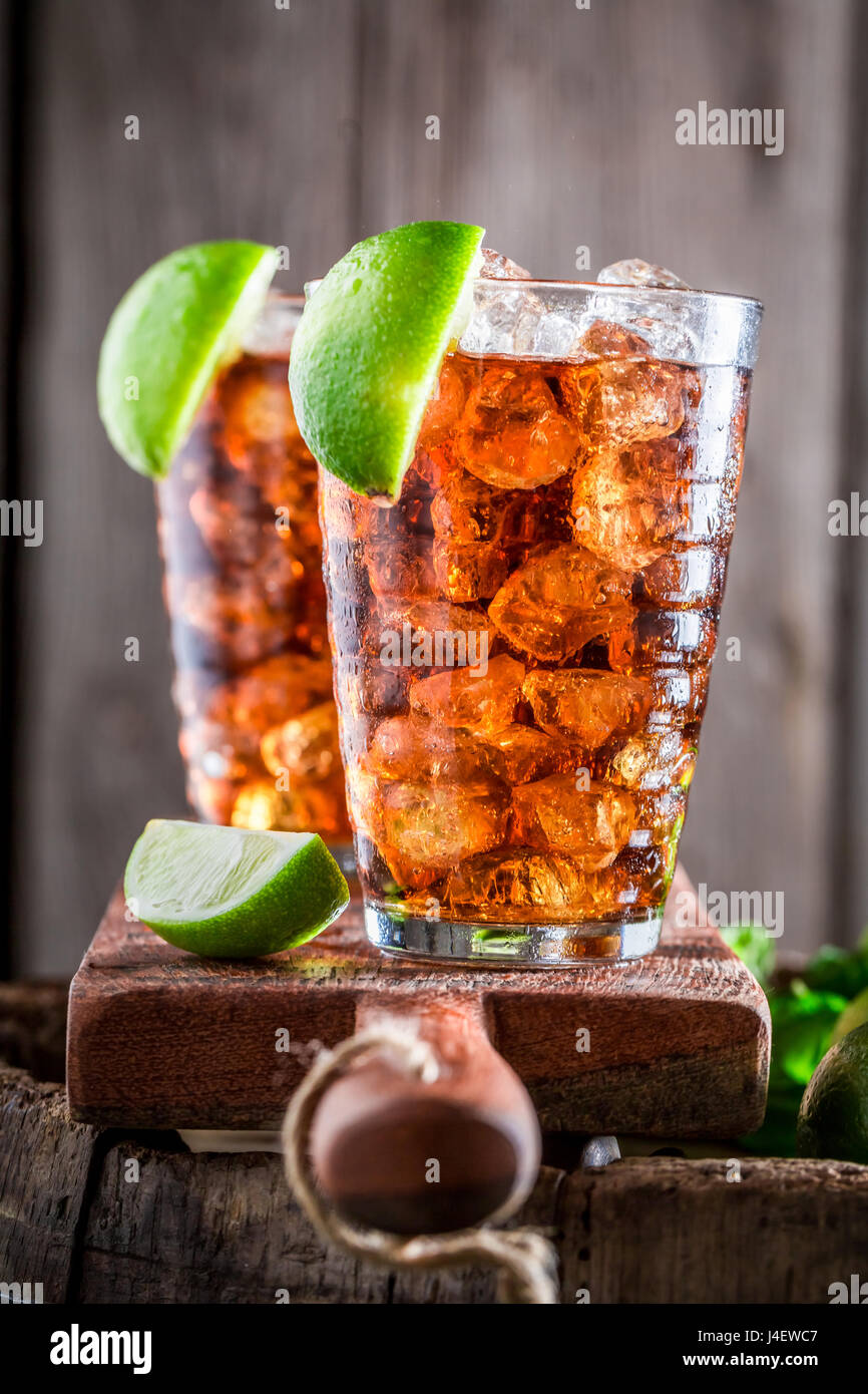 Sweet Long Island drink with cola and citrus fruits Stock Photo - Alamy