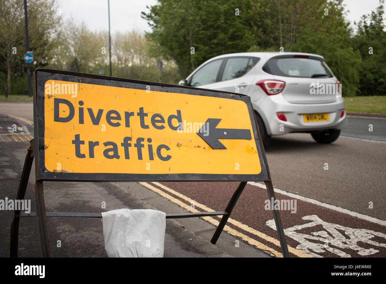 A diverted traffic sign Stock Photo - Alamy