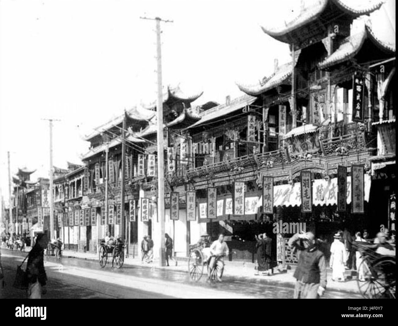 Nanjing Road in Shanghai during the late Qing Dynasty, showing the ...