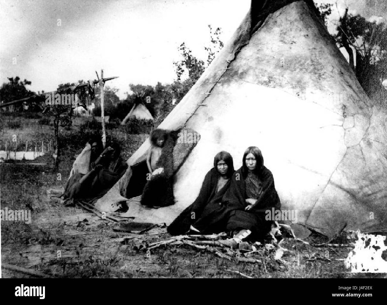 An image depicting an Arapaho camp from around 1870, showcasing the ...